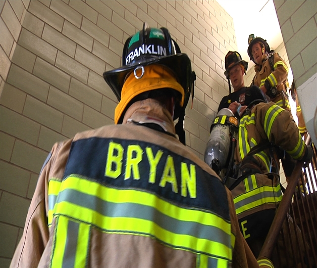 Bryan Firefighters Climb Varisco Building | kagstv.com